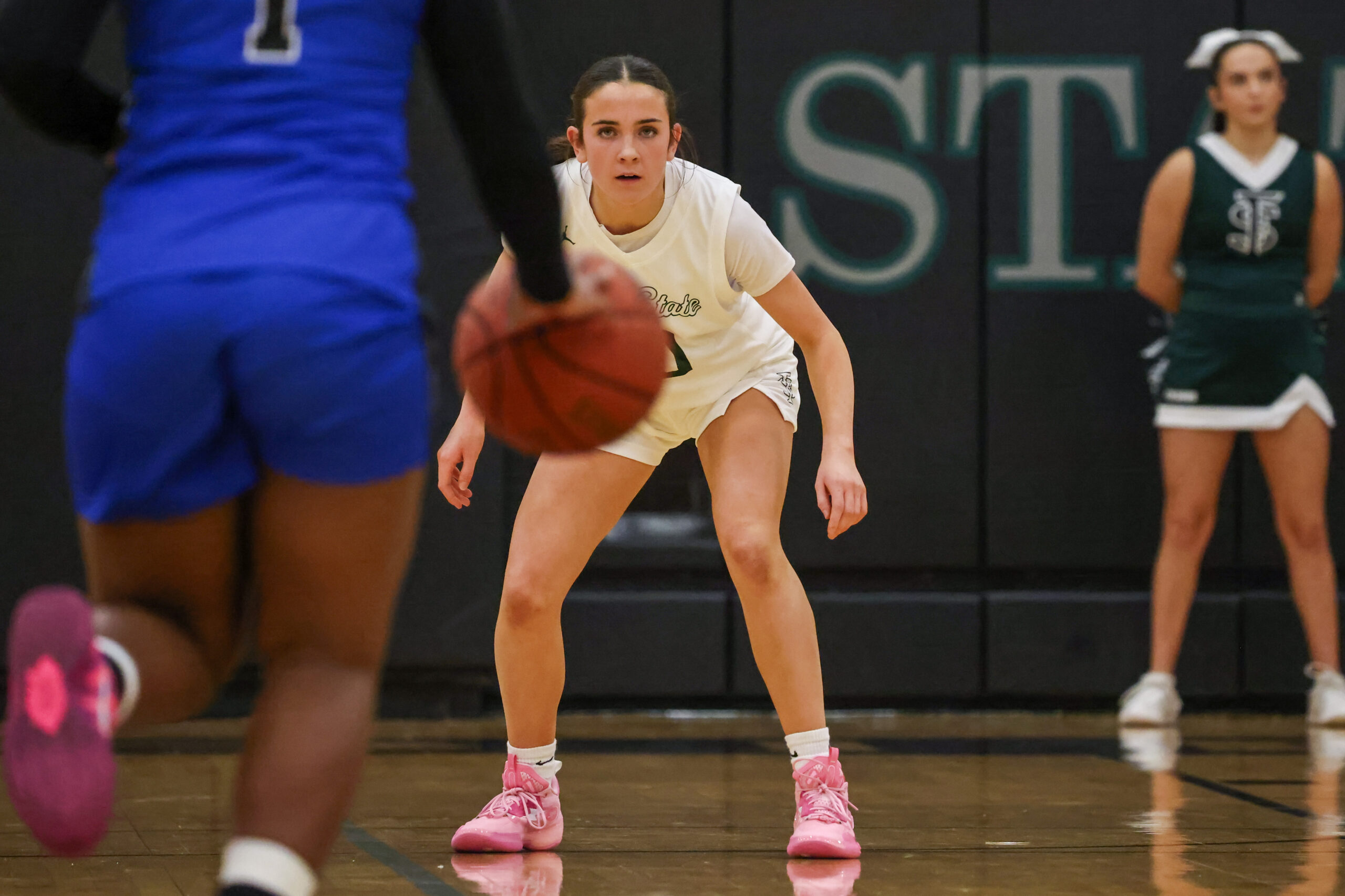 Free State basketball teams split season opening twin bill with ...
